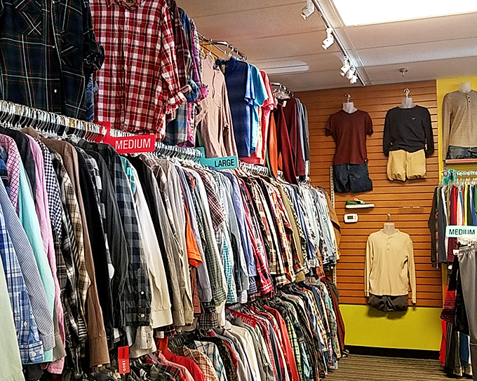 Men's shirts organized by size and color&mdash;proof that secondhand shopping doesn't have to feel like a treasure hunt in a tornado.
