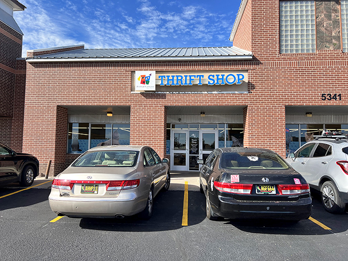 The unassuming brick exterior houses a wonderland of secondhand treasures, where every purchase helps furry friends find forever homes.