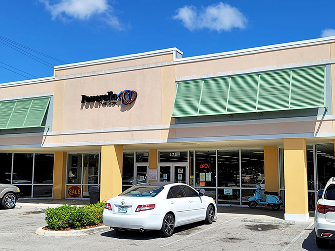 The unassuming storefront hides a treasure trove within, like finding the entrance to Narnia between a nail salon and a sandwich shop.