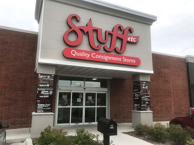 The iconic red Stuff Etc sign beckons bargain hunters like a lighthouse for the thrift-obsessed in Clive.