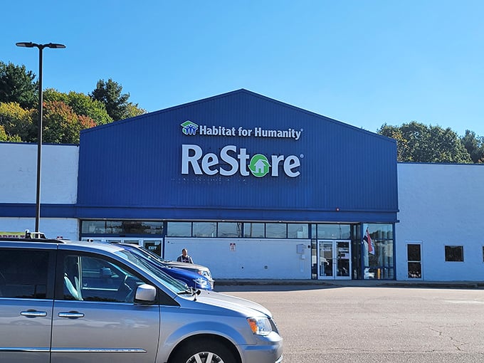 The blue and white exterior promises treasure hunting inside, where every visit reveals completely different discoveries awaiting your cart.