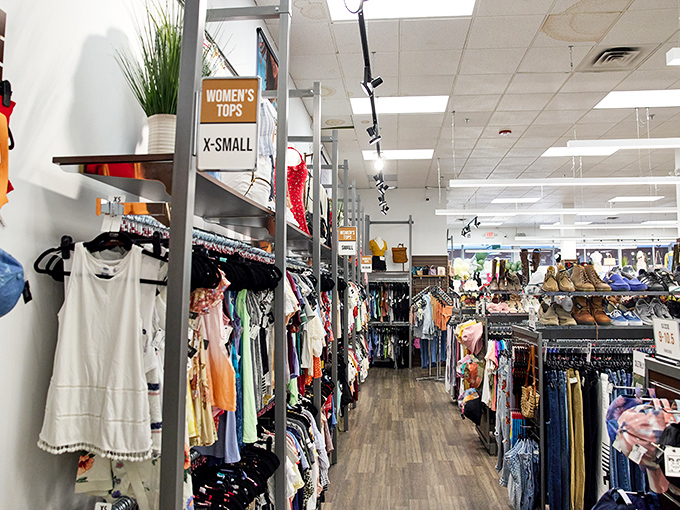Retail therapy paradise awaits with neatly organized racks stretching into the distance. This isn't your grandmother's thrift store&mdash;it's fashion heaven with a budget-friendly halo.