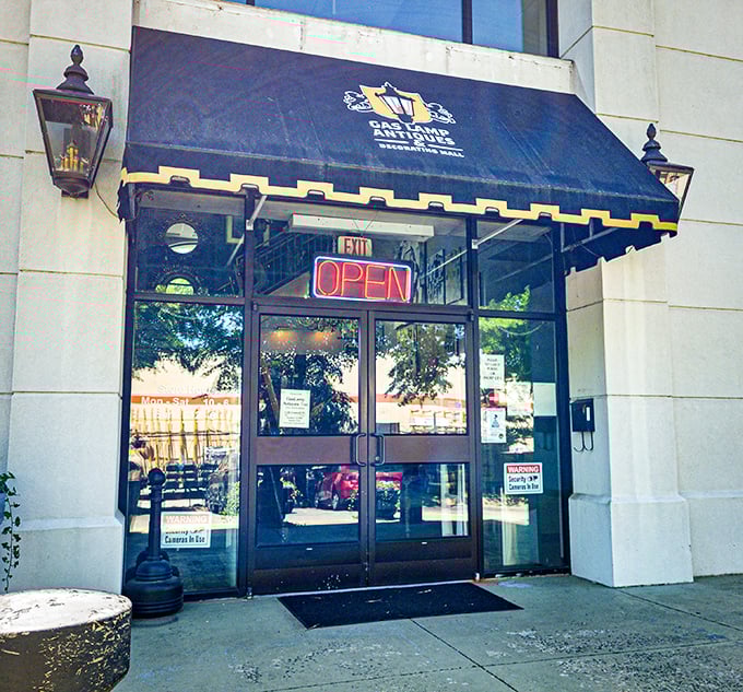 The iconic black awning of GasLamp beckons vintage enthusiasts like a beacon of nostalgia in Nashville's urban landscape.