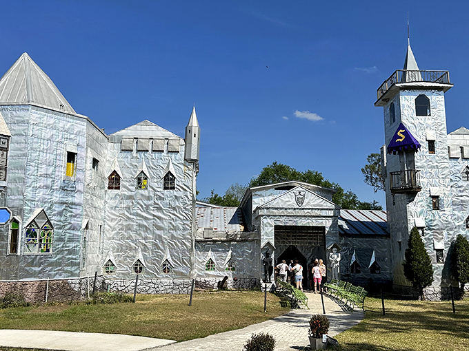 The shimmering facade of Solomon's Castle catches Florida sunlight like a disco ball that decided to settle down in the countryside and become royalty.