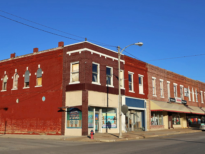 Classic brick storefronts stand sentinel on Cherryvale's Main Street, whispering stories of a century gone by while still serving the community today.