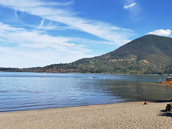 Mount Konocti stands guard over Clear Lake's pristine waters, creating a postcard-perfect backdrop that no filter could improve upon.