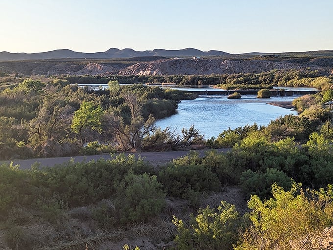 The Rio Grande winds its way through Leasburg Dam State Park, creating a mesmerizing contrast of blue water against the rugged desert landscape. Nature's perfect balancing act!