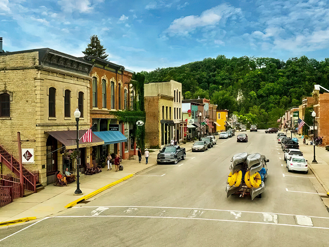 Historic storefronts lined up like old friends who've been keeping secrets about good times for over a century.