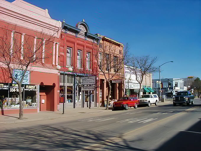Aztec&rsquo;s Main Street blends historic charm with small-town warmth, where brick buildings stand as timeless witnesses to community life beneath New Mexico&rsquo;s endless blue skies.