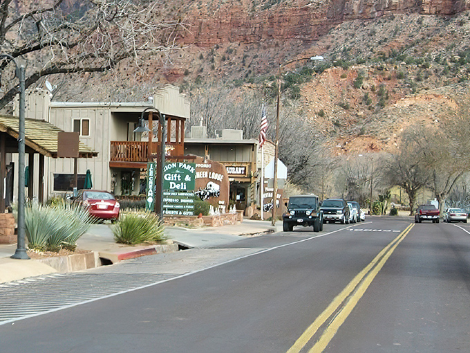 Main Street Springdale unfolds beneath those crimson cliffs like nature's own welcome mat to paradise.