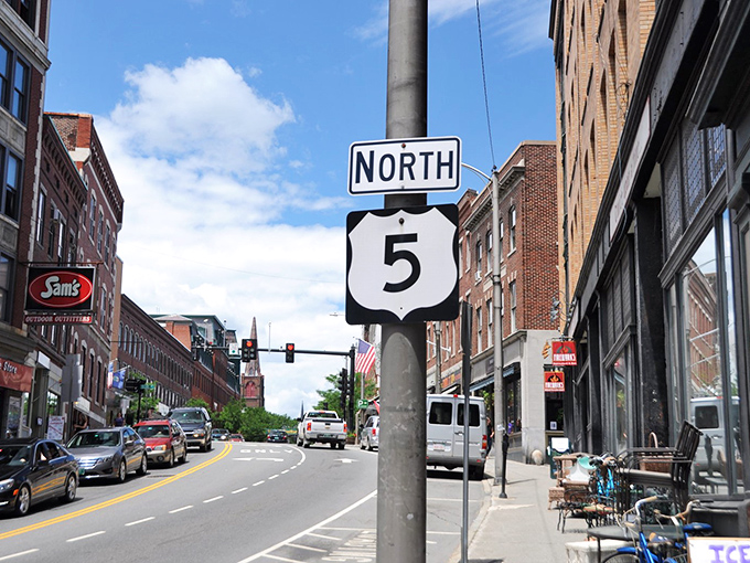 Route 5 cuts through downtown Brattleboro like a lifeline, connecting brick-faced buildings that have witnessed generations of Vermont stories unfold.