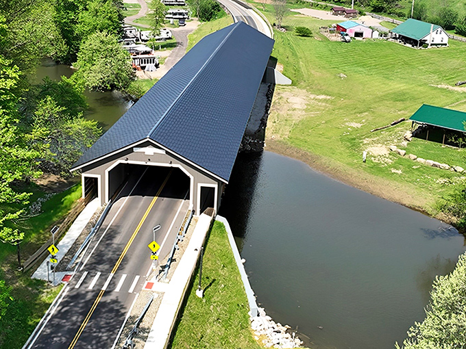Spring brings the covered bridge to life with vibrant greens, creating a perfect frame for memories waiting to be made.