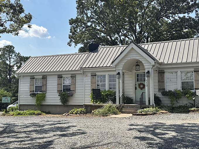 Sunshine bathes the inviting entrance of The Humble Crumb, where those wooden flower boxes promise the same attention to detail you'll find inside.
