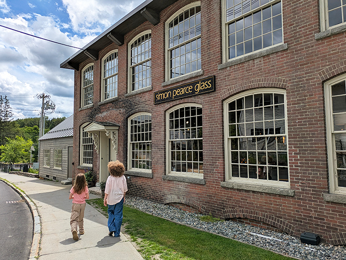 The historic brick exterior of Simon Pearce beckons like an old friend, promising culinary adventures within its storied walls.