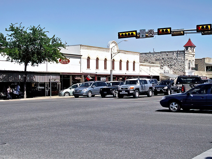 This bustling Main Street scene captures the essence of German-Texan hospitality in action.