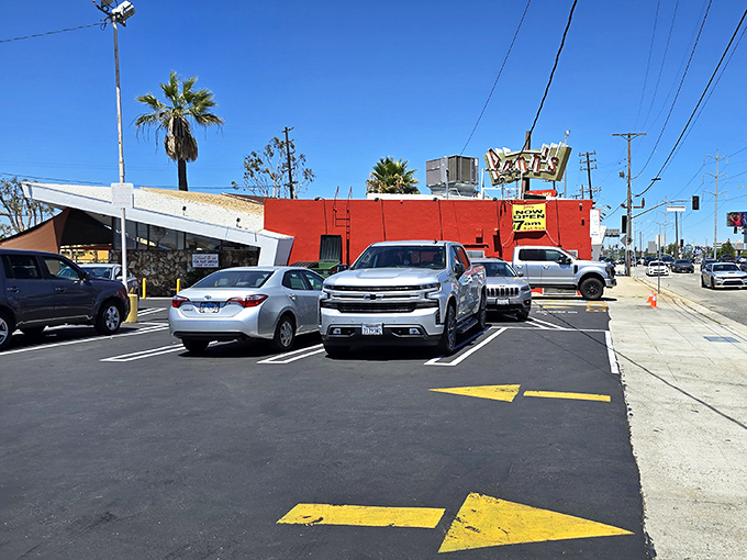 The iconic angular roof and vibrant red exterior of Pann's isn't just eye-catching&mdash;it's a time portal to mid-century California optimism in architectural form.