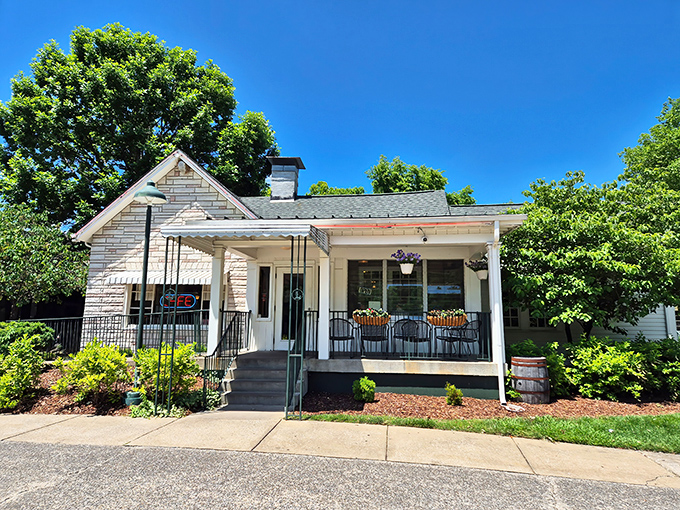 The iconic Loveless Cafe sign stands like a neon beacon of Southern comfort, promising biscuits that have launched a thousand road trips.