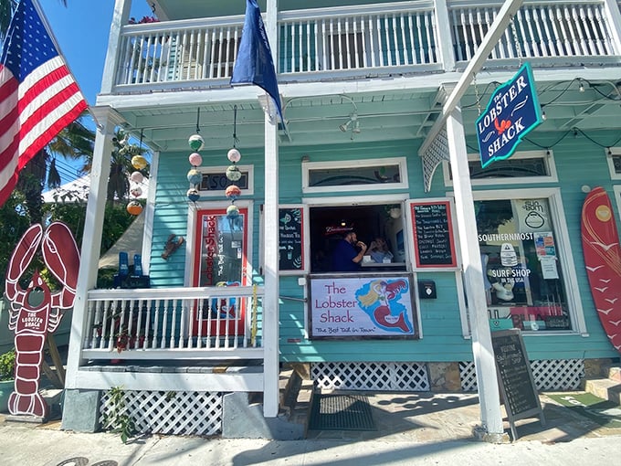A turquoise beacon of seafood salvation in Key West, where the American flag waves as if to say, "Your lobster search ends here, patriot."