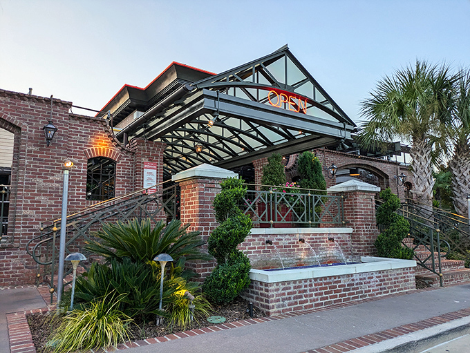 The brick exterior with its welcoming palm trees and covered entrance feels like you've discovered a Louisiana oasis hiding in plain sight in Birmingham.
