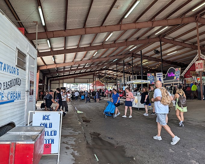 The covered pavilions at First Monday Trade Days buzz with activity, where Taylor's Old Fashioned Ice Cream offers sweet relief from treasure-hunting fatigue.