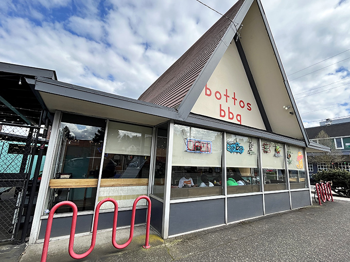 The iconic A-frame building of Botto's BBQ stands like a temple to smoked meat perfection in Portland's Sellwood neighborhood.