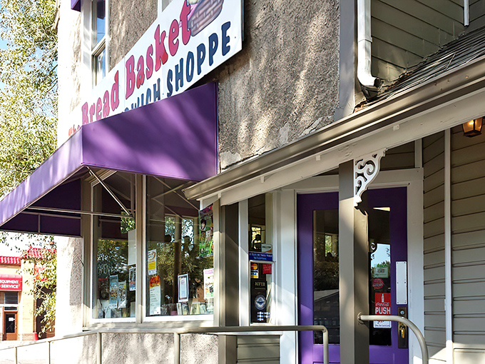 That purple awning is your beacon of hope in a world of mediocre baked goods and broken dreams.