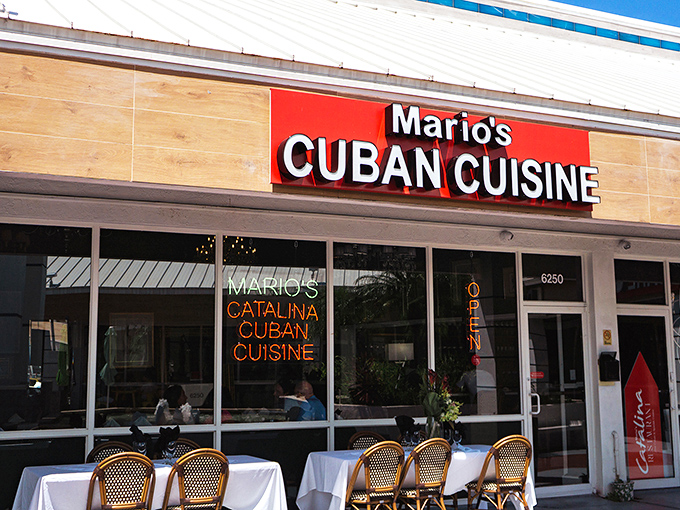 By day, the neon sign rests, but Mario's vibrant energy is already buzzing. Cuban comfort food with a side of sunshine.