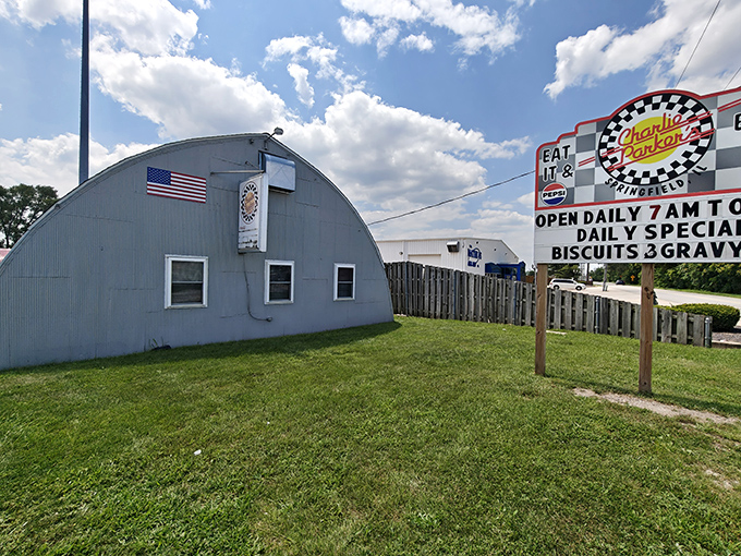 Blue skies frame this unassuming breakfast landmark, where the checkered logo and promise of biscuits & gravy have been drawing hungry pilgrims for decades.
