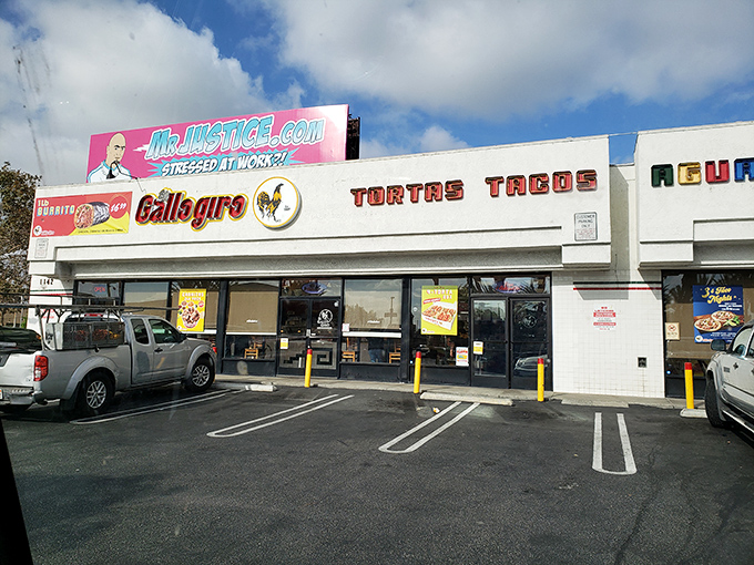The rooster has landed! El Gallo Giro's iconic storefront in Santa Ana stands as a beacon of authentic Mexican cuisine, its proud logo promising culinary adventures within.