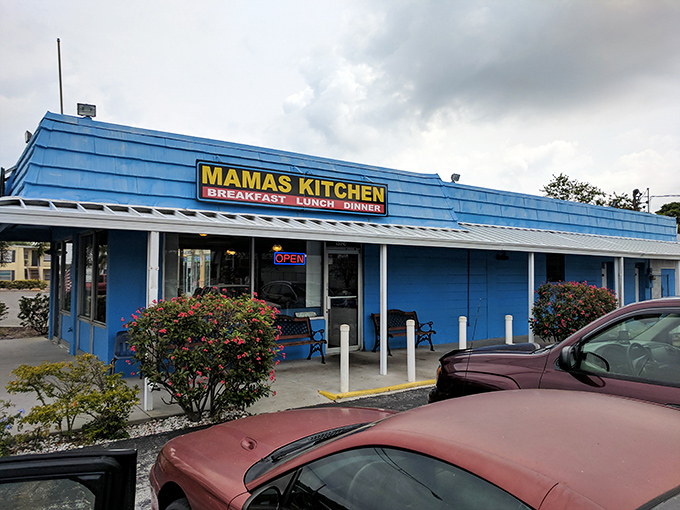 The bright blue exterior of Mama's Kitchen stands out like a beacon of breakfast hope on Tampa's busy Dale Mabry Highway.