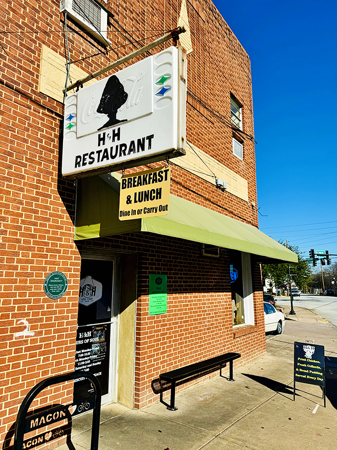 H&H's iconic sign has welcomed hungry Maconites for generations, its distinctive silhouette and lime-green awning standing as a beacon for Southern cuisine seekers in downtown Macon.