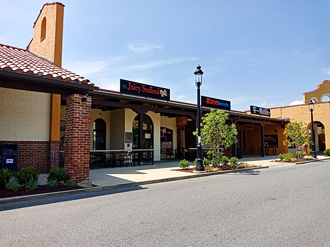 Mediterranean-inspired architecture meets seafood paradise at Juicy Seafood. The stucco walls and terracotta roof might whisper "Spanish villa," but the menu screams "coastal feast" with Maryland flair.