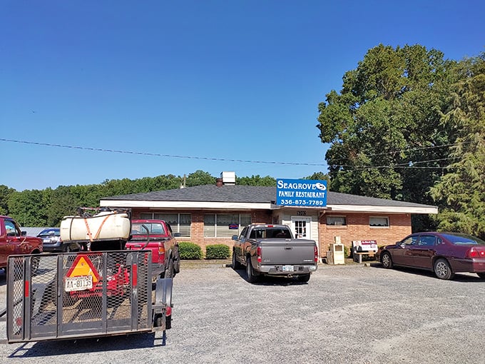 The unassuming brick exterior of Seagrove Family Restaurant stands as a beacon for hungry travelers and locals alike. No frills, just honest food awaits.