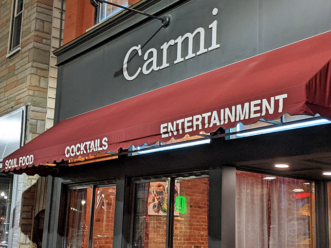That "Carmi" sign is the perfect beacon for soul food, cocktails, and entertainment. Good times await!