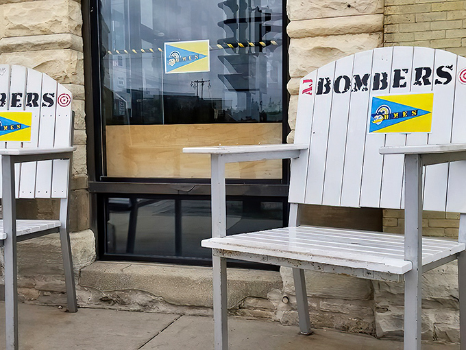 White Adirondack chairs emblazoned with the Bombers logo welcome you like old friends ready for a chat about burgers and life.
