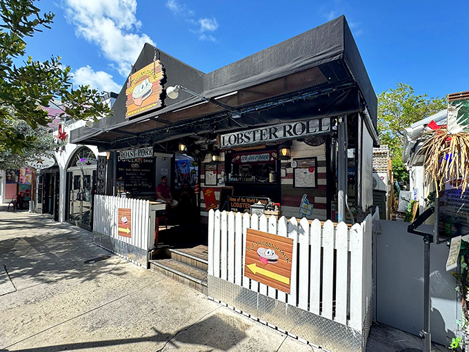 The unassuming facade of DJ's Clam Shack on Duval Street proves that in Key West, the best seafood treasures often come in humble packages.