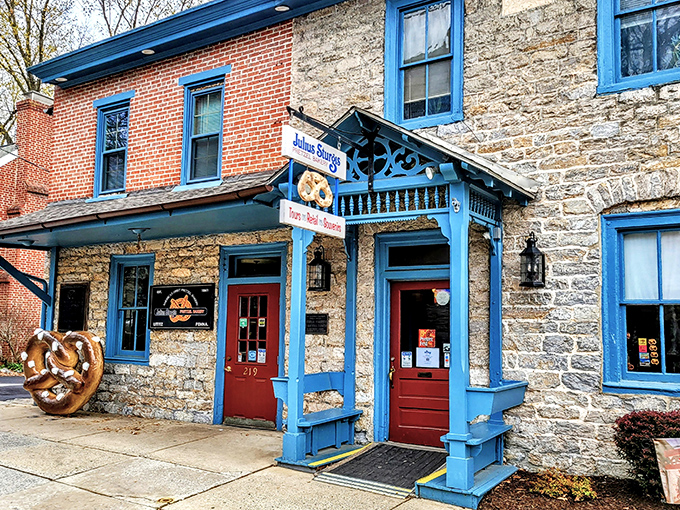 The historic stone facade of Julius Sturgis beckons like a time machine with bright blue trim and that irresistible giant pretzel sculpture.