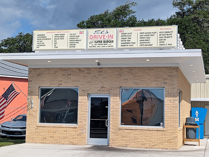 A glimpse of El's brick exterior, where hungry patrons exit with that "I just found burger nirvana" glow. No fancy frills, just food worth the drive.