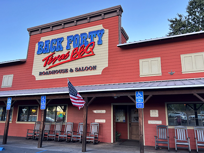The bright red exterior of Back Forty Texas BBQ stands proud in Pleasant Hill, like a beacon calling hungry travelers home to Texas-style comfort.