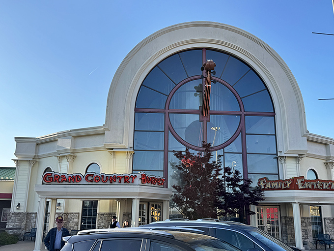 The grand arched entrance to Grand Country Buffet beckons hungry visitors with a promise of comfort food paradise inside.
