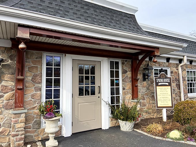 Step inside the Spring House Tavern for a warm welcome! This Pennsylvania gem offers great food and hospitality.