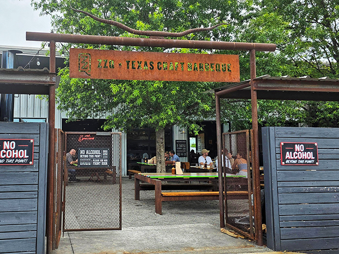 That distinctive orange sign marks the entrance to one of Virginia's most talked-about barbecue destinations in Scott's Addition.