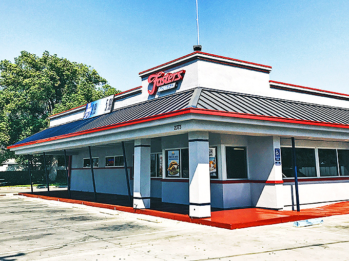 That classic blue and white exterior practically glows like a beacon calling hungry travelers home for a proper meal.