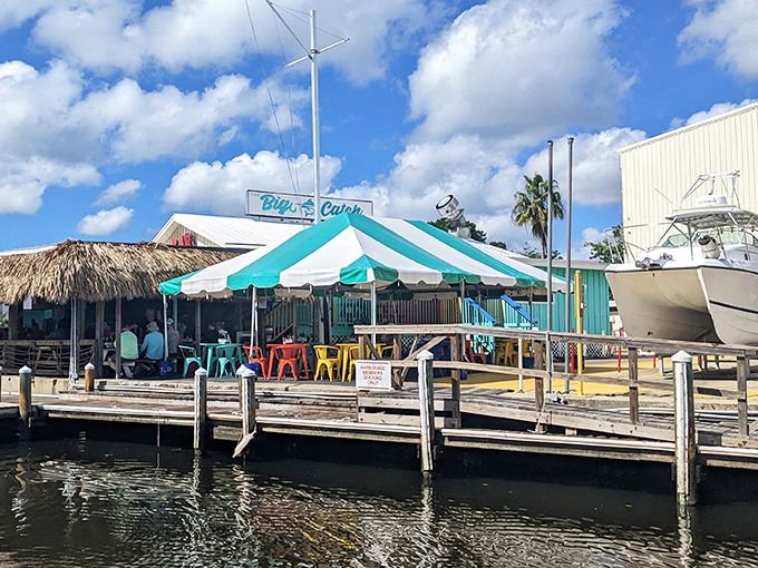 The waterfront paradise where seafood dreams come true. Colorful chairs and a striped awning invite you to kick back where boats and appetites dock with equal enthusiasm.