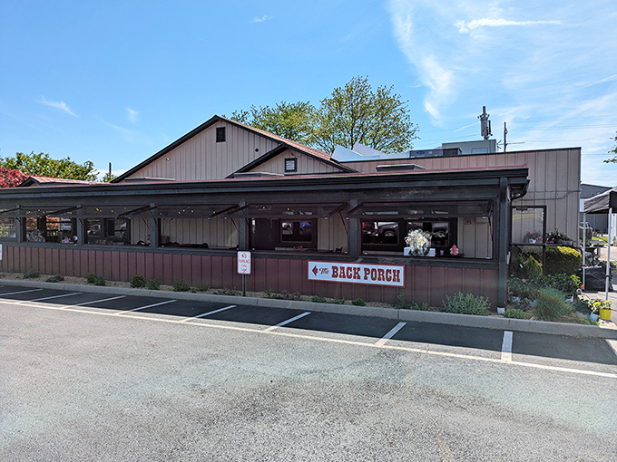 The unassuming exterior of The Back Porch Saloon stands like a culinary speakeasy, promising comfort food treasures for those in the know.