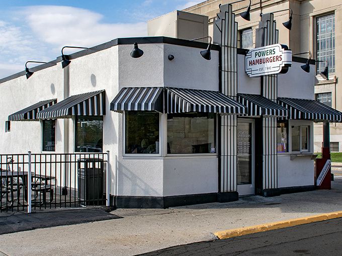The iconic white building with bold red lettering looks like it was plucked straight from a vintage postcard&mdash;proof that sometimes, the simplest promise of a good burger is all it takes to make history.
