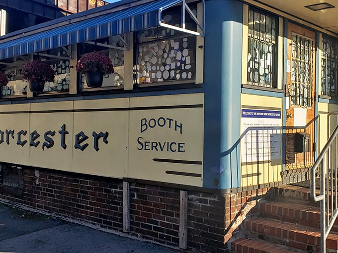 The classic blue and cream exterior proudly displays "Worcester" and "Booth Service," inviting hungry patrons up those brick steps.