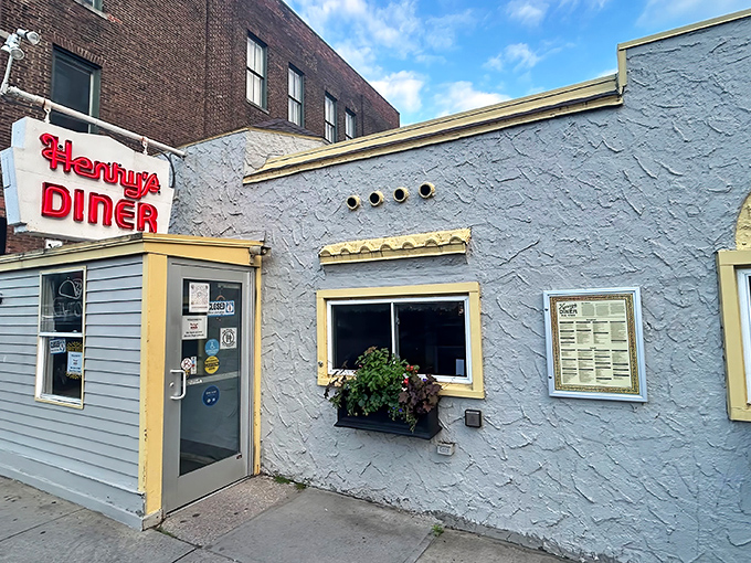 Henry's Diner's modest exterior belies the breakfast paradise within. That iconic red neon sign has been guiding hungry Vermonters to breakfast bliss for generations.