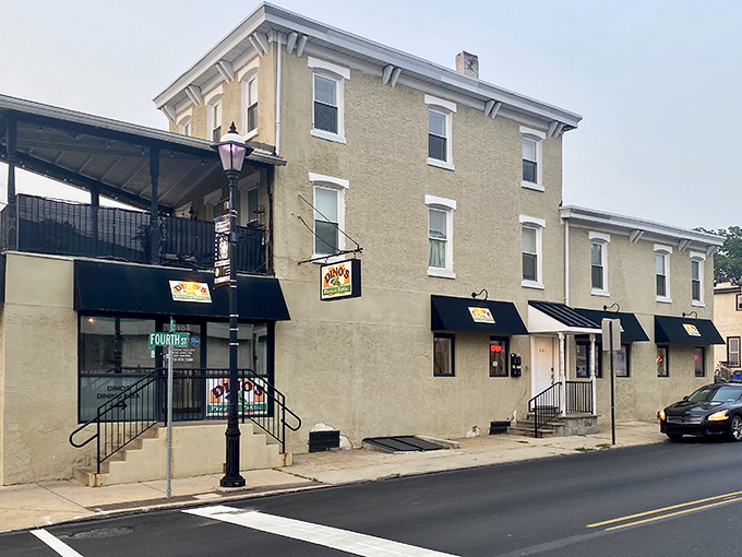 The unassuming exterior of Dino's Pizza & Pasta in Bridgeport hides culinary treasures within, like a delicious secret waiting to be discovered.