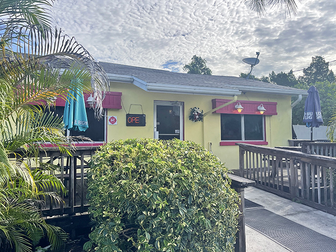 The cheerful yellow exterior of Leo's French Toast House stands out like Florida sunshine, promising comfort food that's worth the drive to Alva.